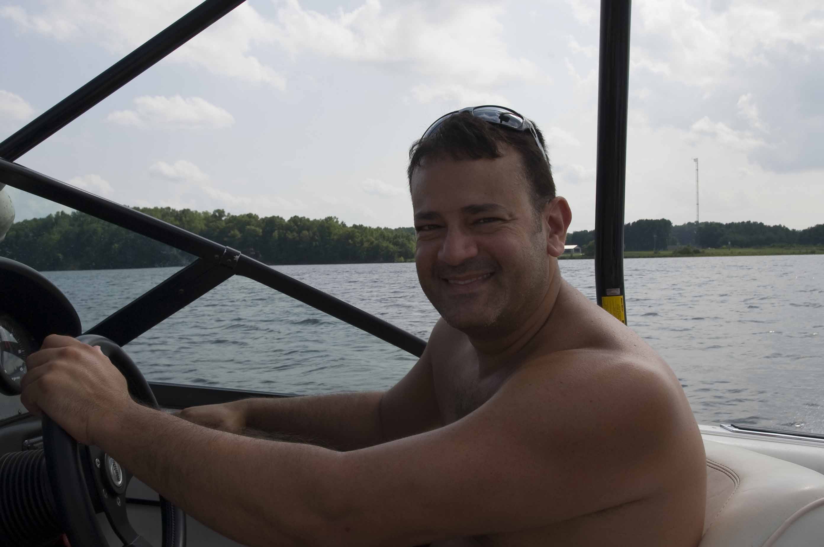 Steve Driving Boat - Driven to Excel
